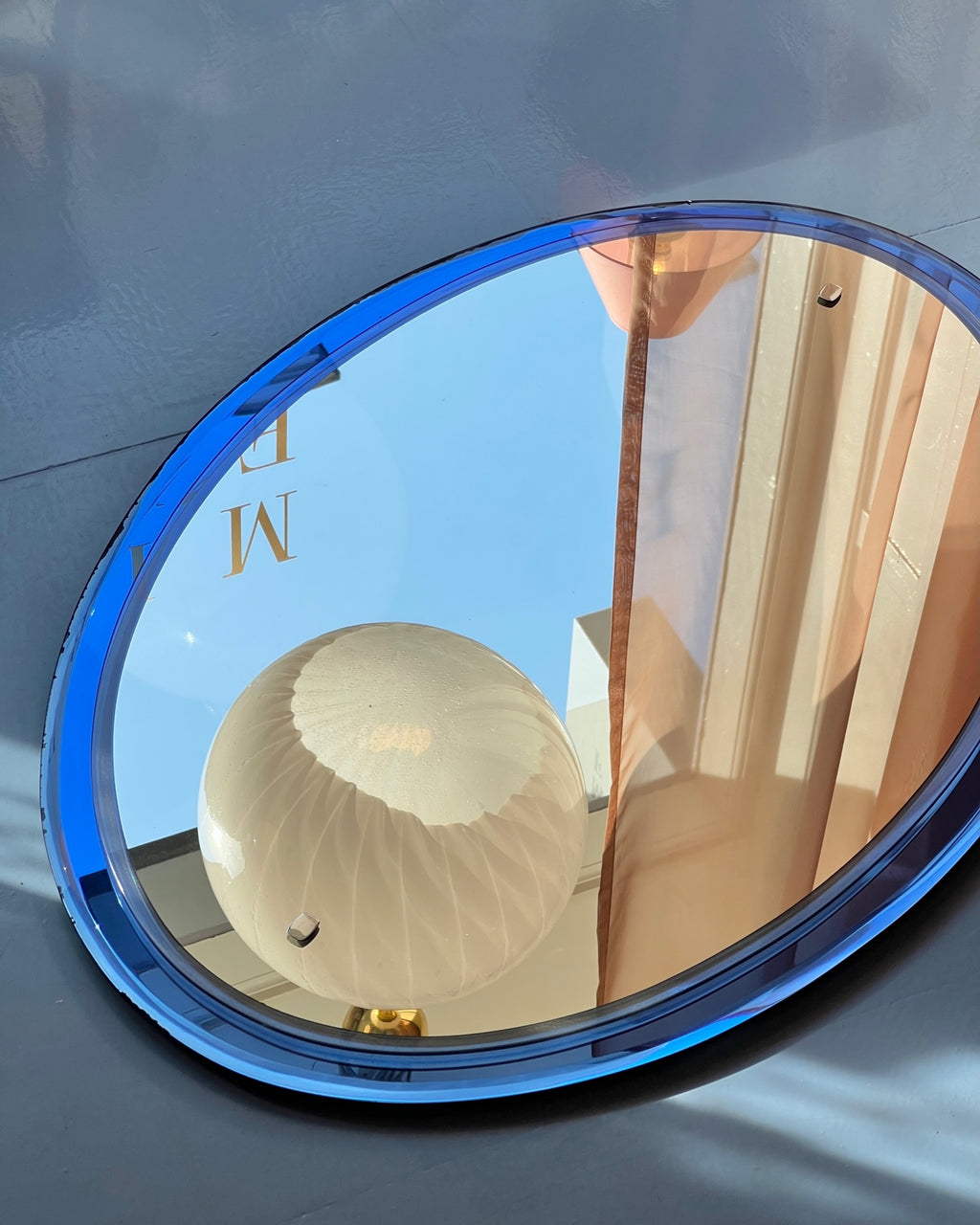 Vintage Italian mirror with blue mirror frame – Millefiori Interior